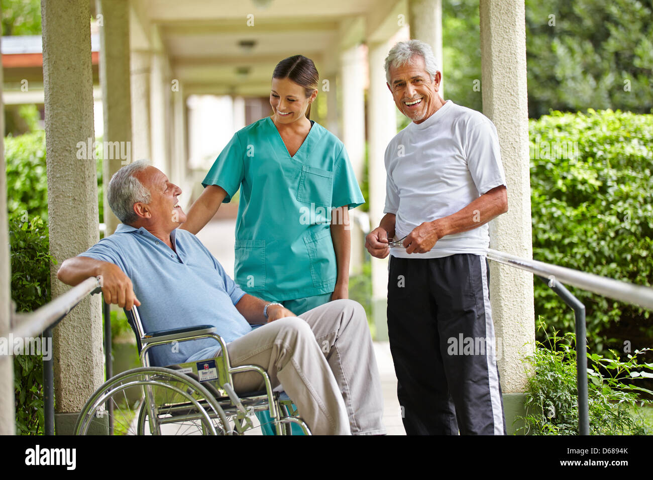 Two elderly senior citizens walk hi-res stock photography and images ...