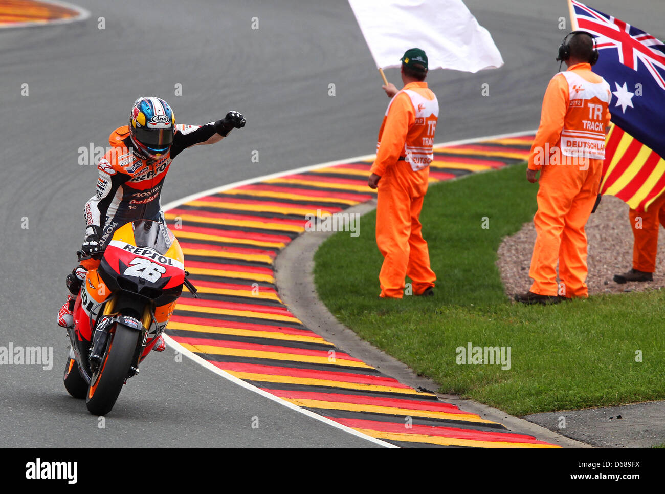 Spanish rider Daniel Pedrosa of Team Repsol Honda celebrates his win in ...