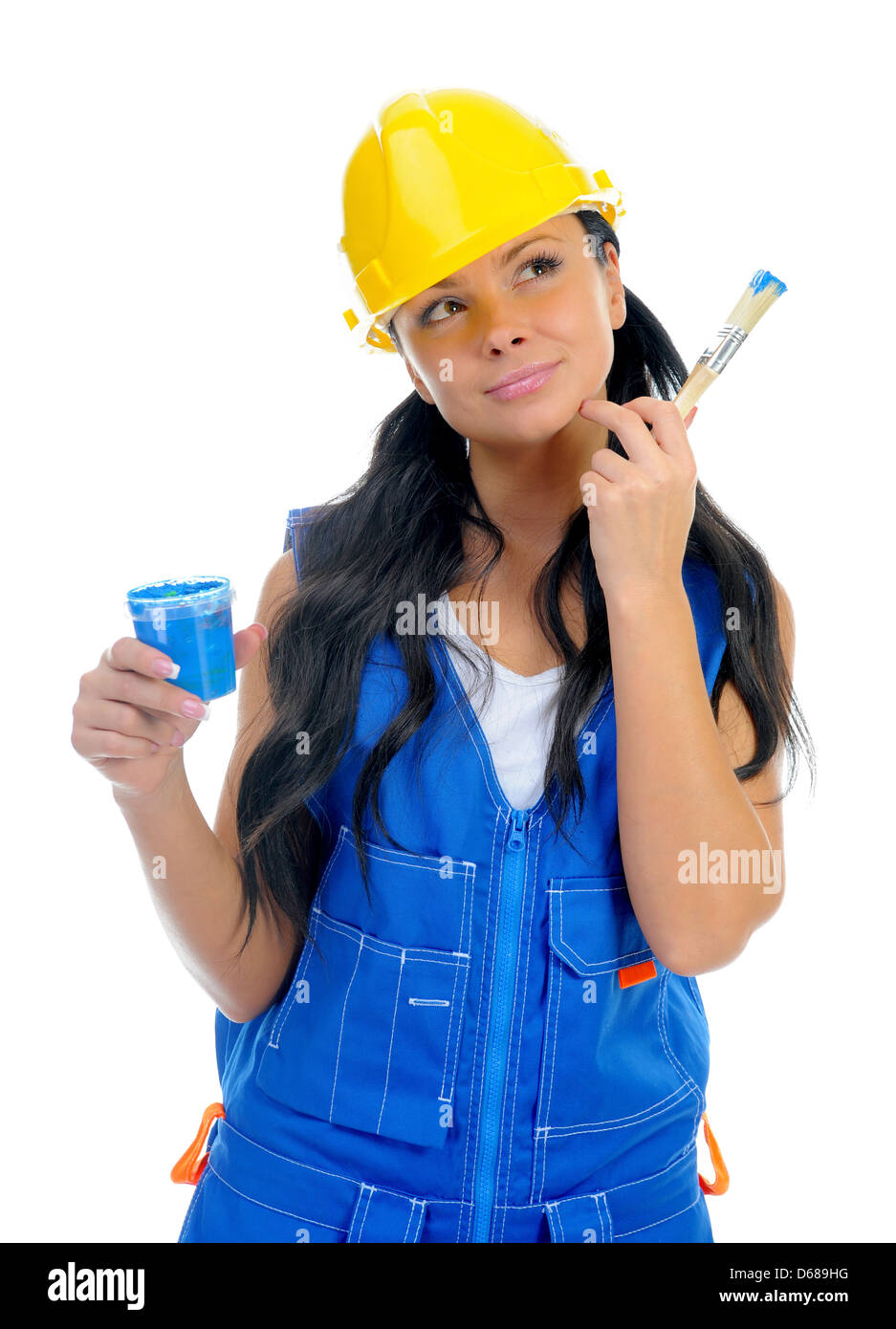 Beautiful young woman doing repairs Stock Photo - Alamy
