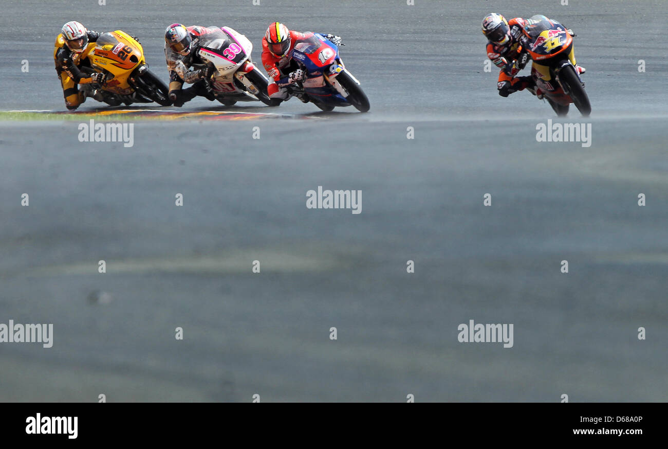 German rider Sandro Cortese of Team Red Bull KTM leads the Moto3 race ...