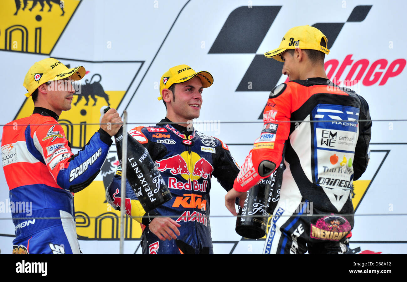 German rider Sandro Cortese of Team Red Bull KTM (C) wins the Moto3 ...