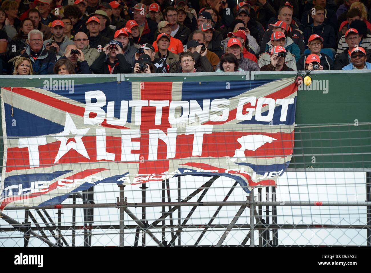 Fans with a banner «Buttons got talent» pictured during the Grand Prix ...
