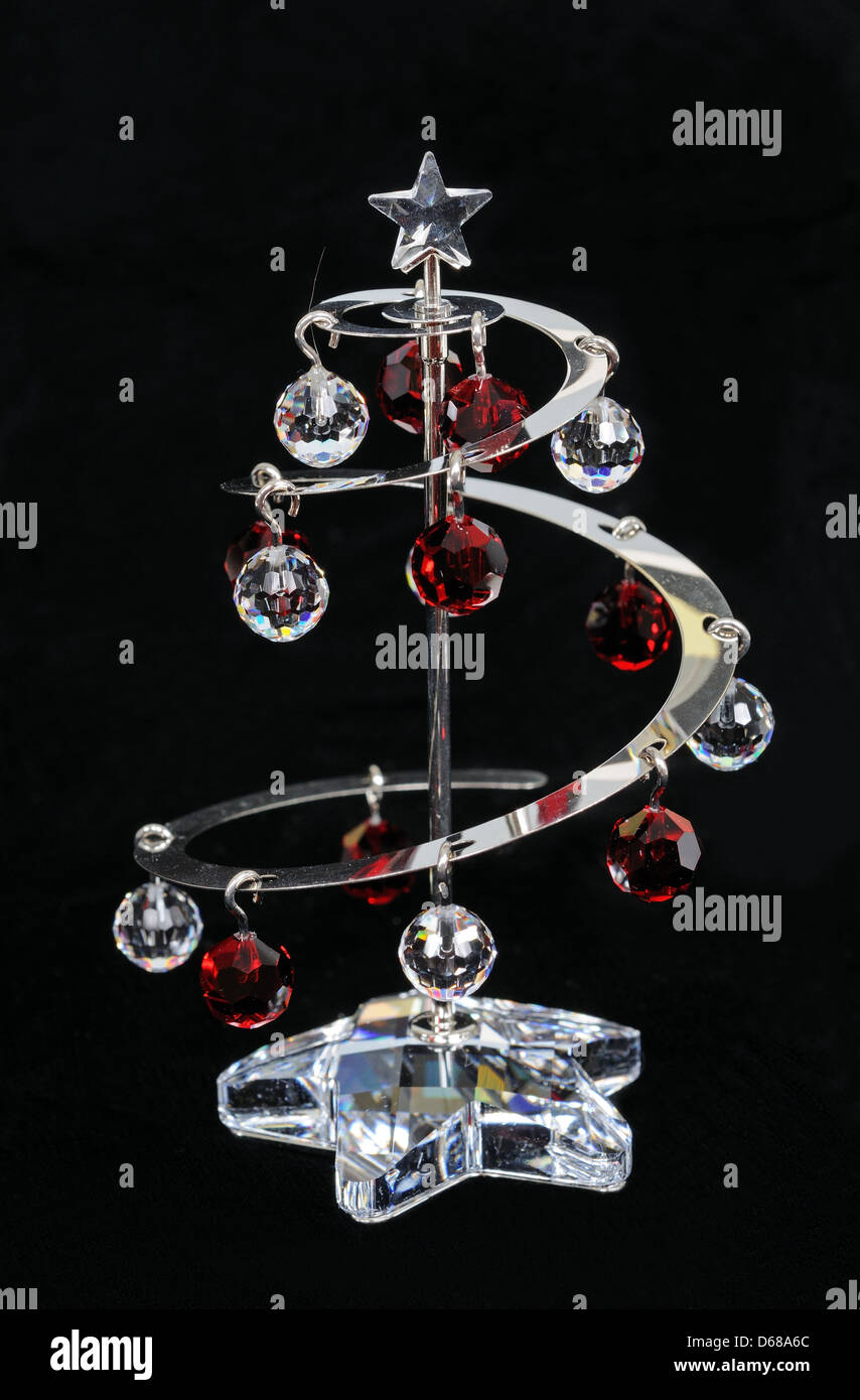 Crystal Christmas tree against a black background Stock Photo - Alamy