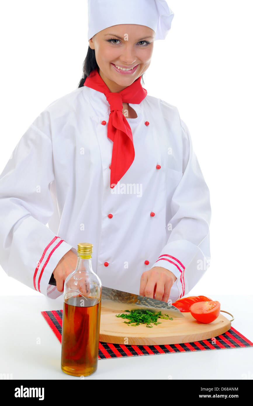Chef cuts the tomato Stock Photo - Alamy