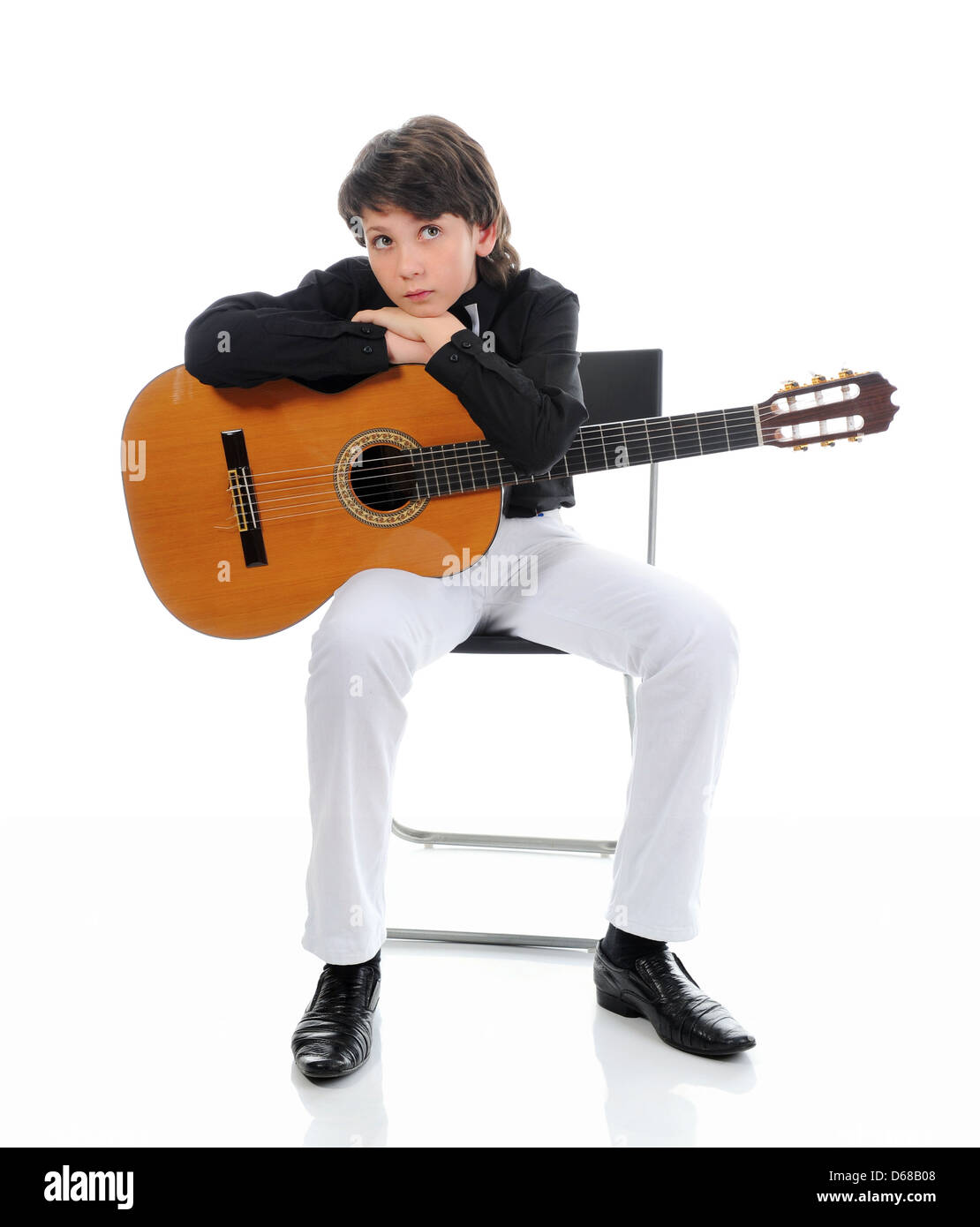 Little boy musician playing guitar Stock Photo - Alamy