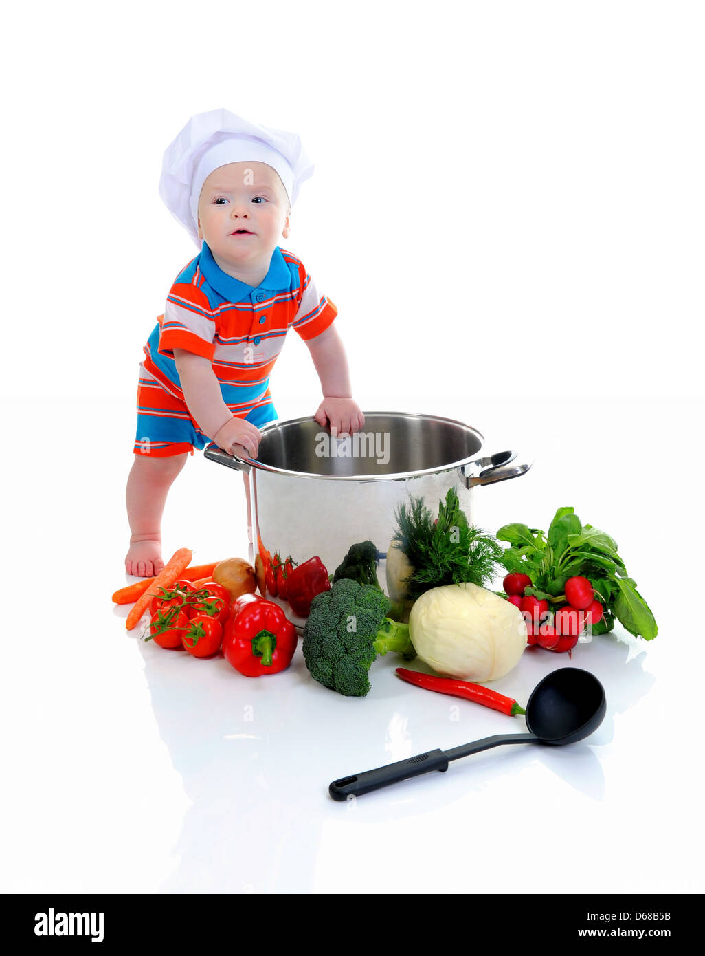 Boy with a pan Stock Photo - Alamy
