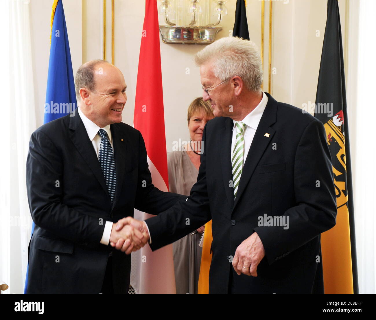 Prince Albert II of Monaco (L) poses for a photograph with Baden ...