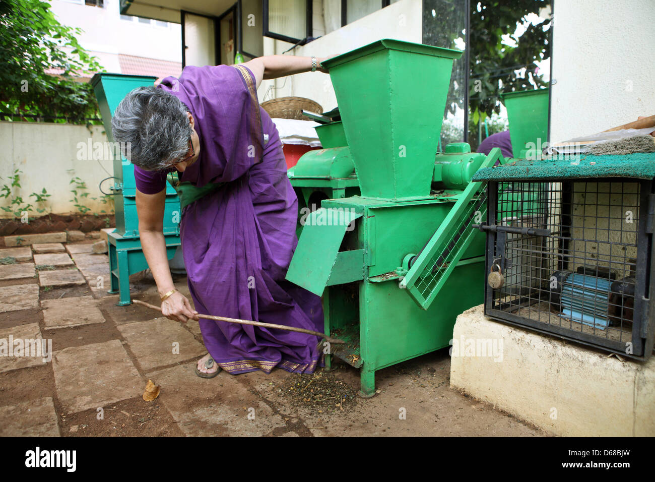 Indian doctor Meenakshi Bharath demonstrates how to chaff her household ...