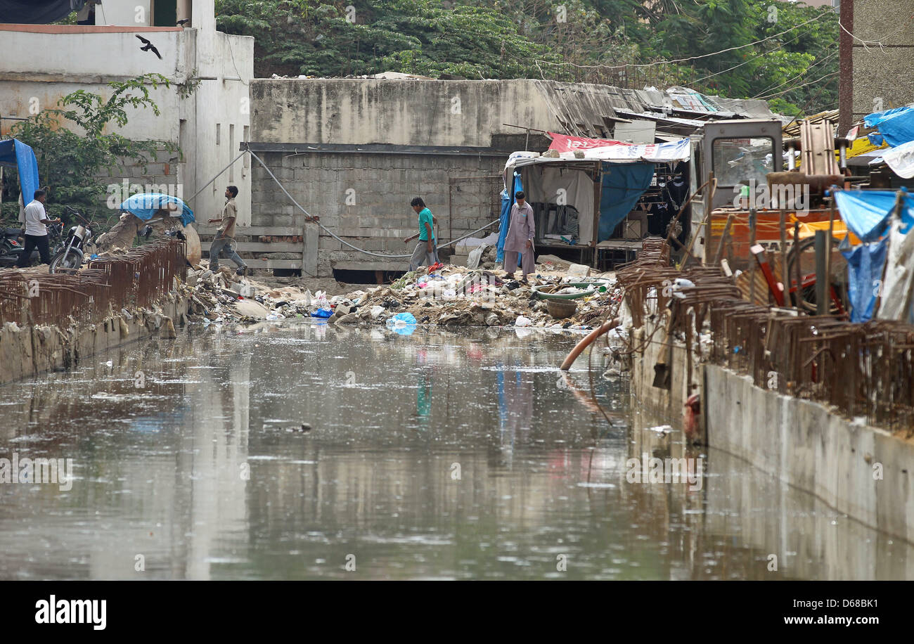 A river polluted with garbage and rubbish is pictured in Bangalore ...