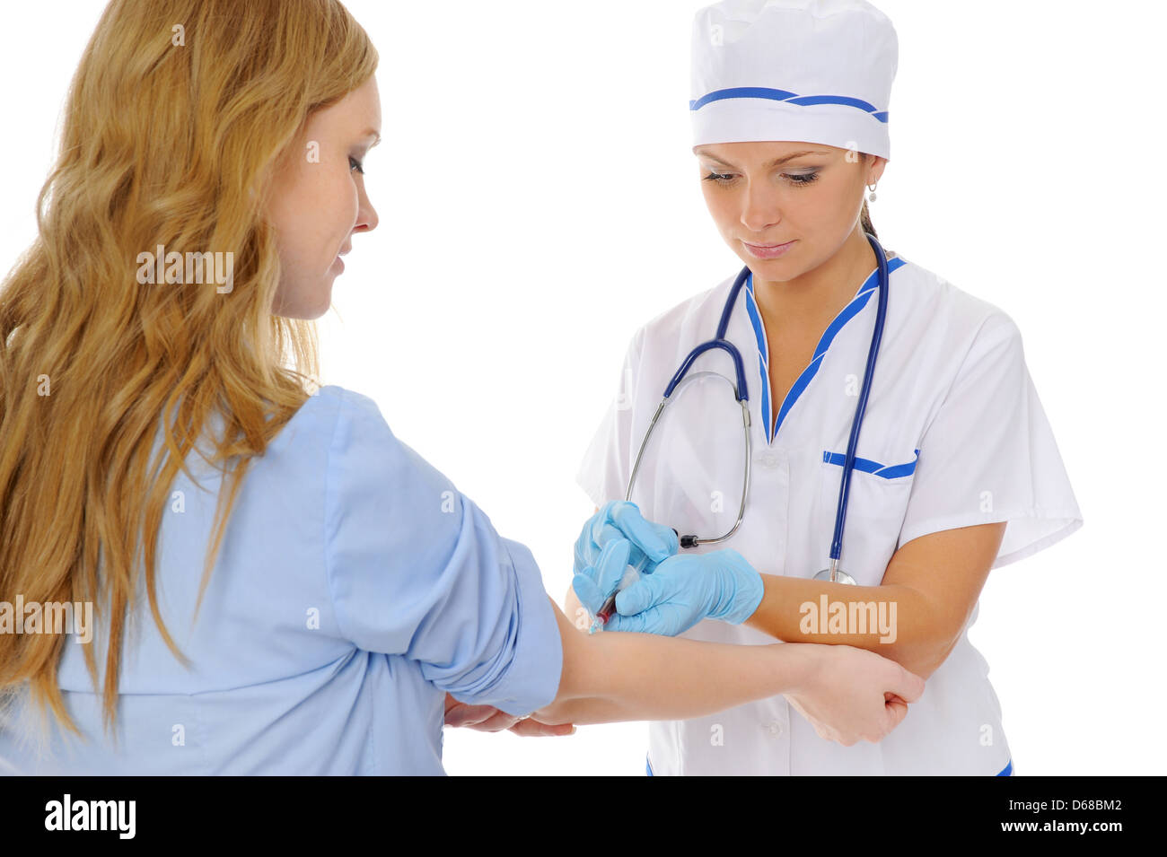 Young doctor makes the patient an injection Stock Photo - Alamy