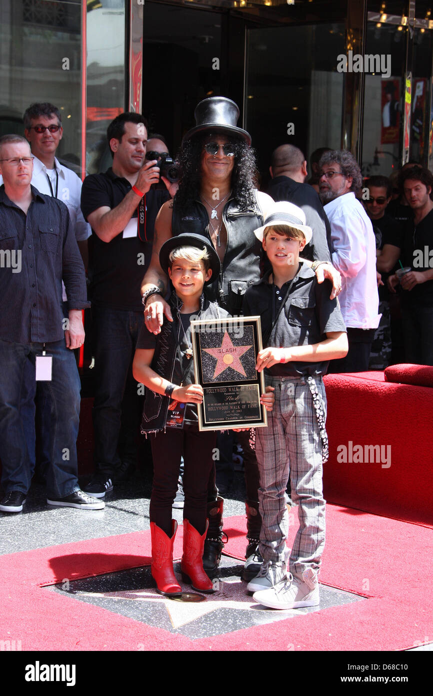 US musician Slash (back ) poses with his sons Cash (front, L) and ...