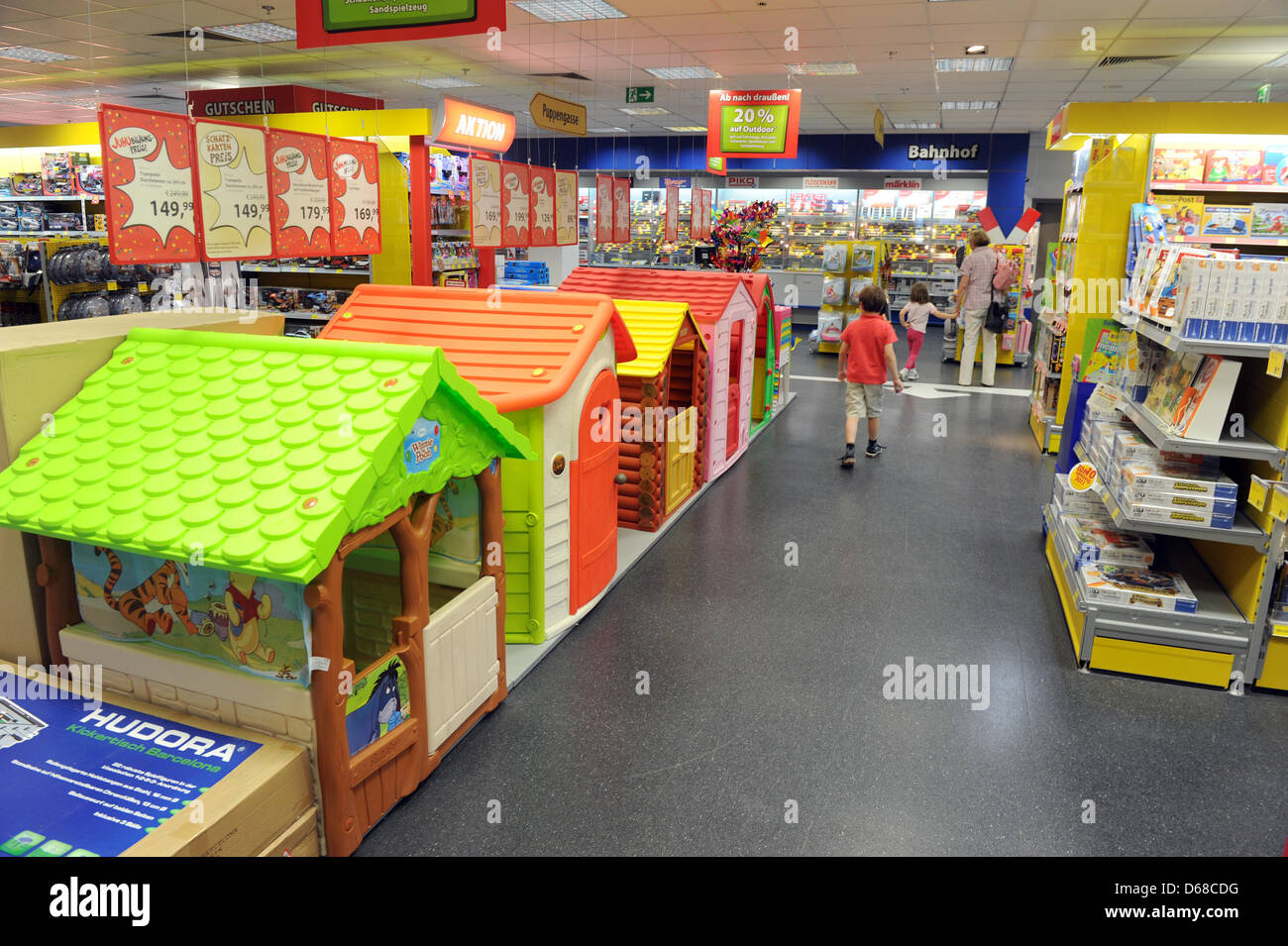 Plastic toy houses sit in a toy store in Berlin, Germany, 19 June 2012 ...