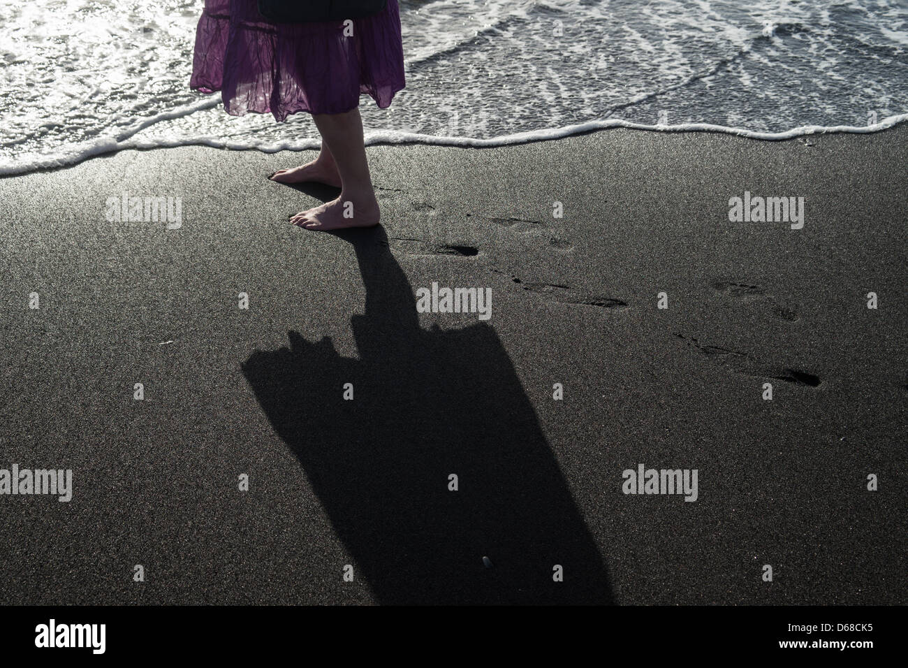 Winter sun woman walking shadow hi-res stock photography and images - Alamy