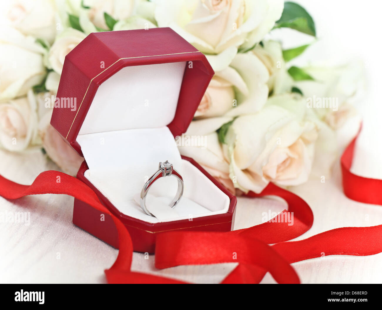 Marriage proposal. An engagement diamond ring Stock Photo - Alamy