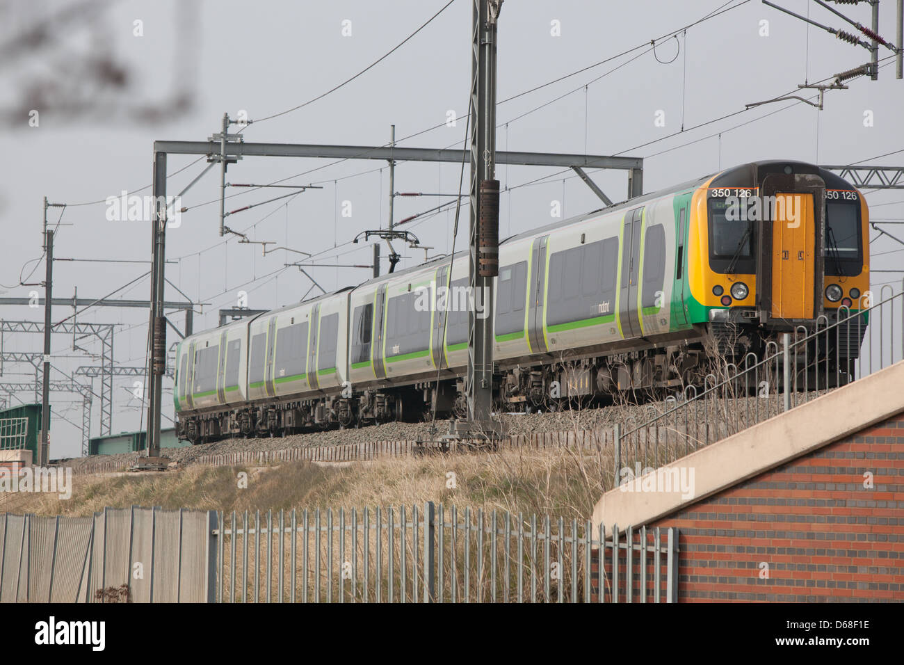 A London Midland train on the West Coast Mainline in the Midlands Stock Photo - Alamy