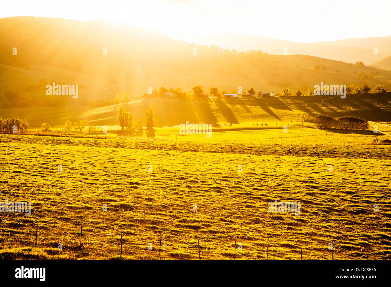 Australian sunset over a farm Stock Photo - Alamy