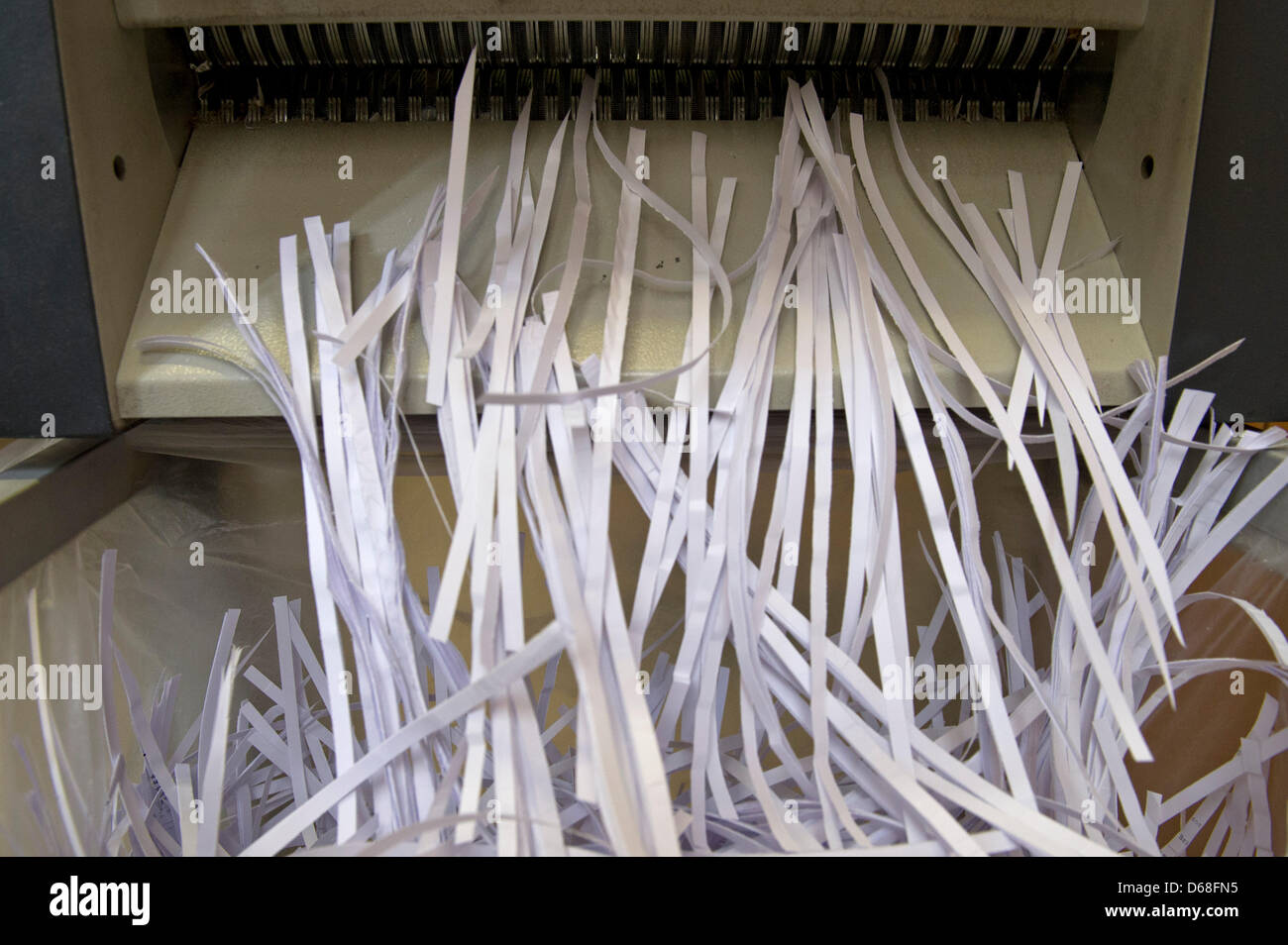 ILLUSTRATION - An illustrated picture shows documents being shredded in ...