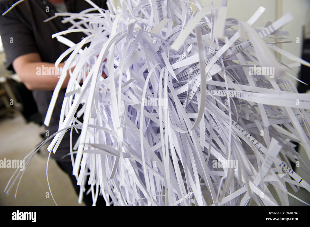 ILLUSTRATION - An illustrated picture shows documents being shredded in ...