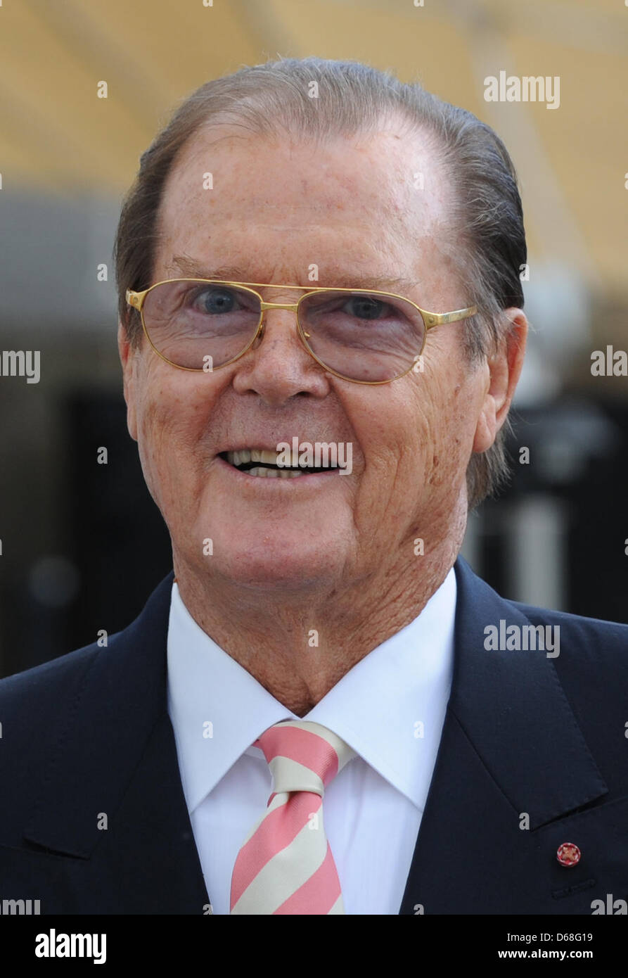 British actor Sir Roger Moore attends the opening of the hotel 'Bell ...