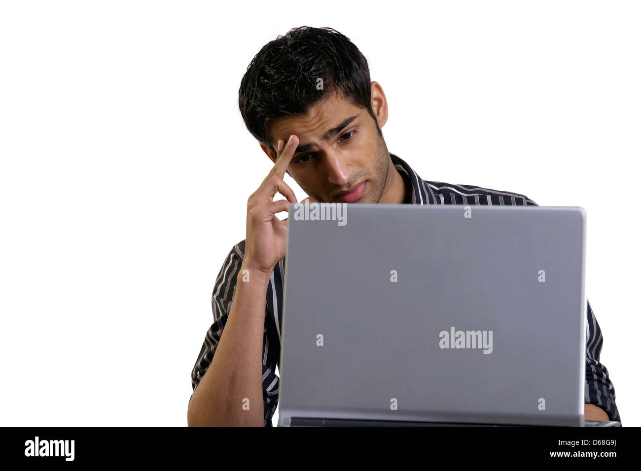 Portrait of a man tensed at work Stock Photo - Alamy