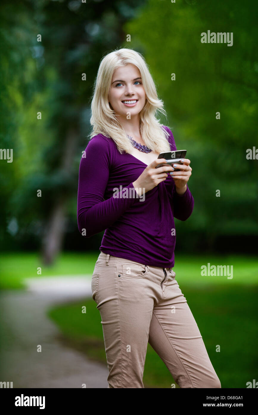 Woman Using Cell Phone Stock Photo - Alamy