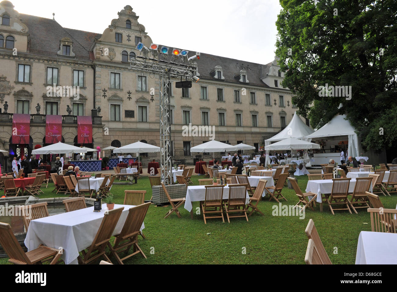 Set tables are visible in the inner courtyard of Castle St. Emmeram ...