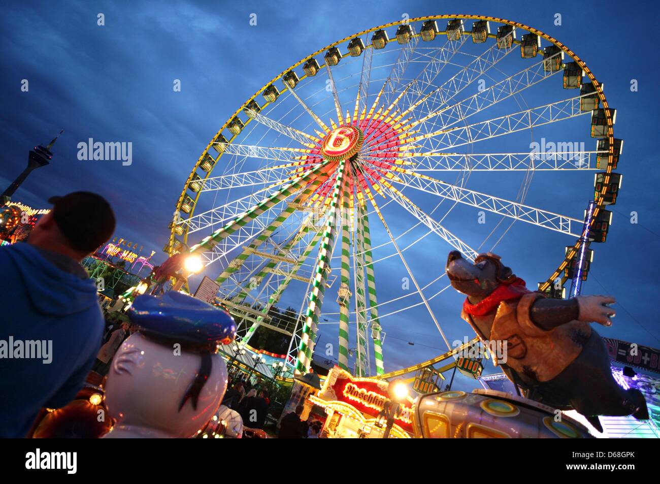 A ferris wheel is featured at the Duesseldorf Rhine Fair 2012 ...