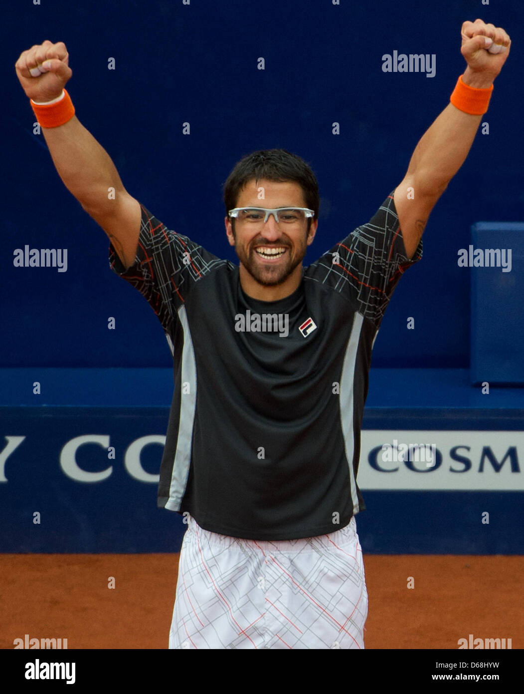 Serbia's Janko Tipsarevic celebrates his victory against Argentina's ...