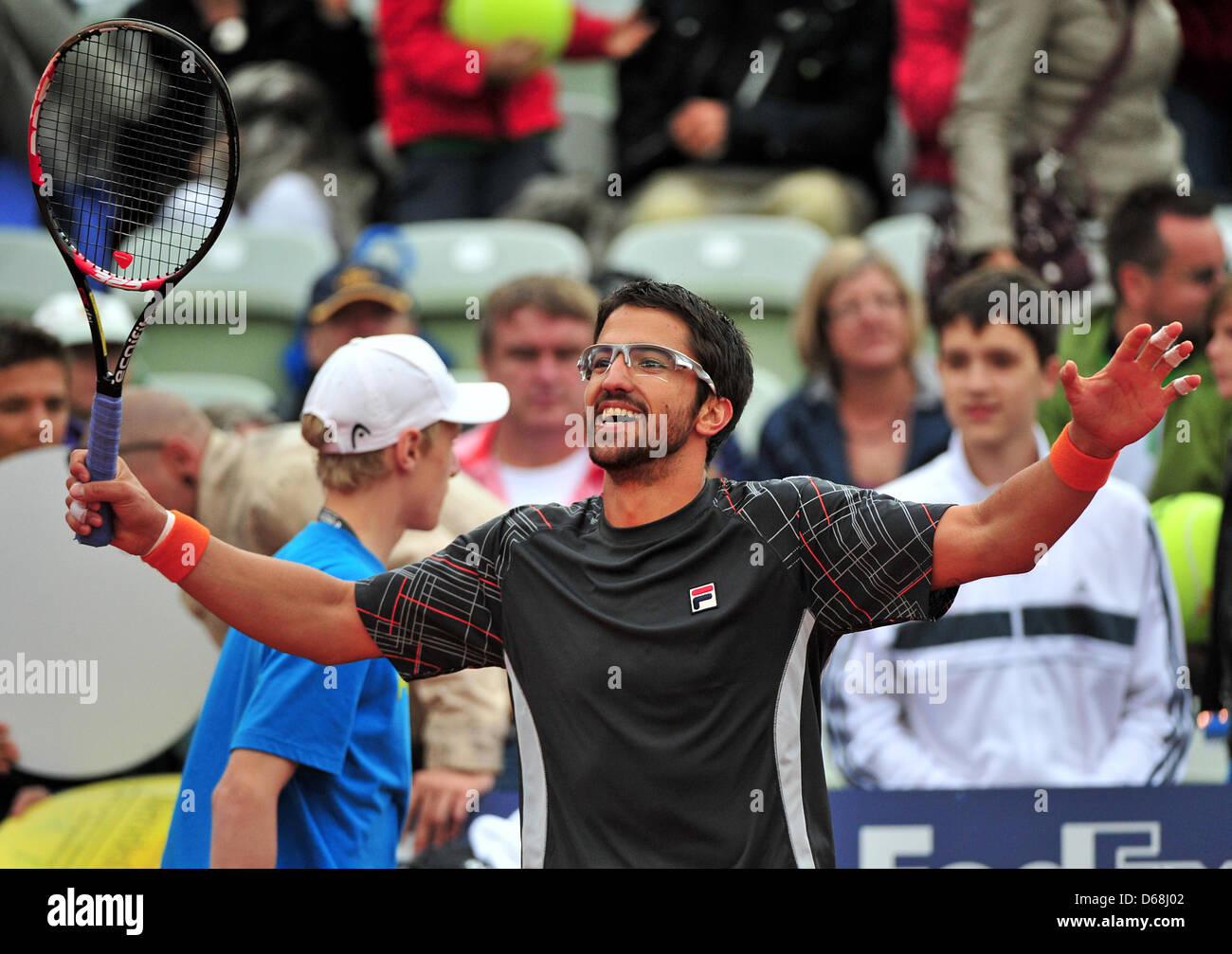 Serbia's Janko Tipsarevic celebrates his victory against Argentina's ...