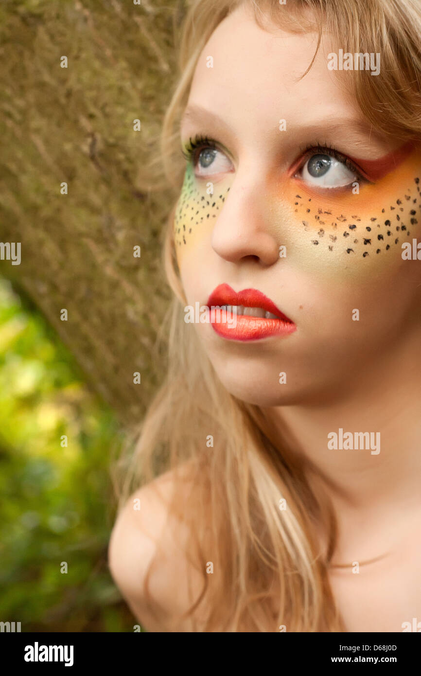 Happy teenager in a forest in the autumn Stock Photo - Alamy