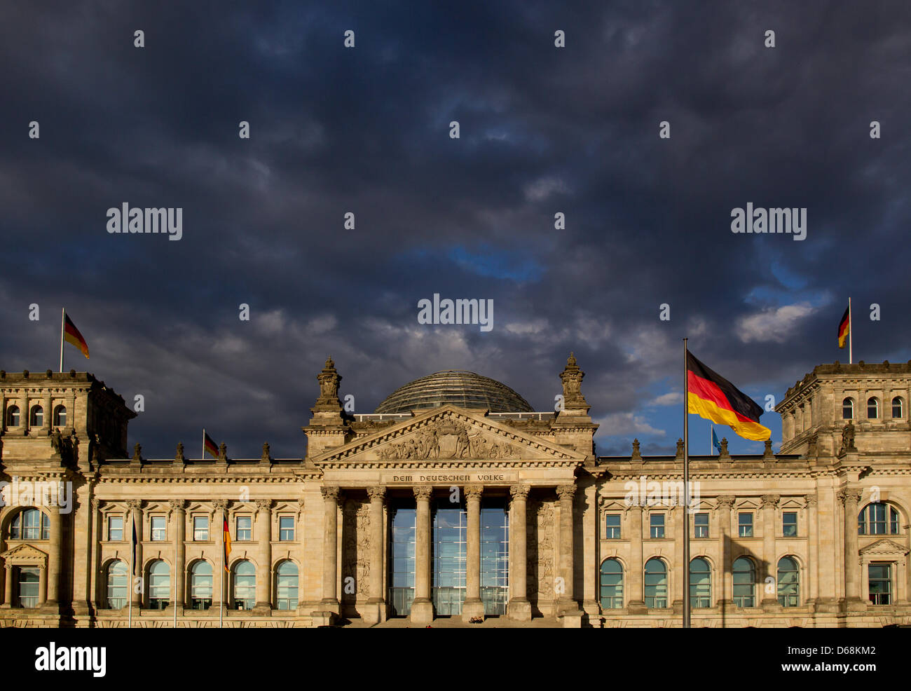 Dark clouds pass over the Reichstag Building in Berlin, Germany, 18 ...