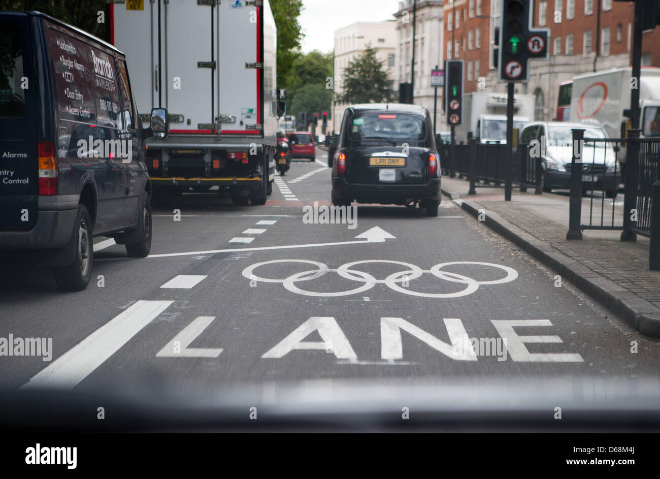 A taxi drives on the Olympic Lane in London, Great Britain, 18 July ...