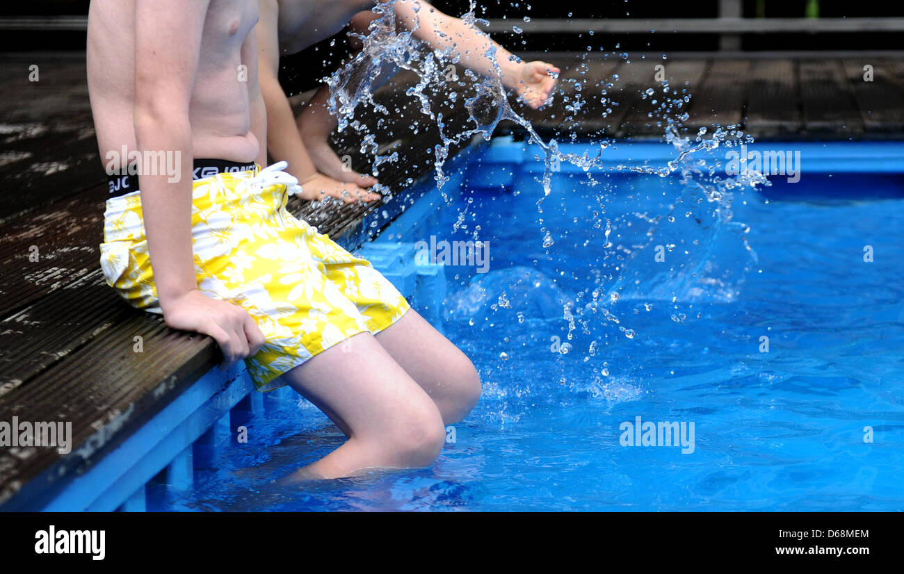 Two boys splash in the pool at the Zollverein Coal Mine Industrial ...