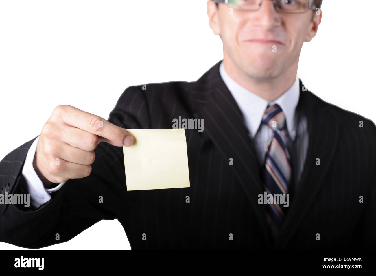 Businessman showing a sticky note Stock Photo - Alamy