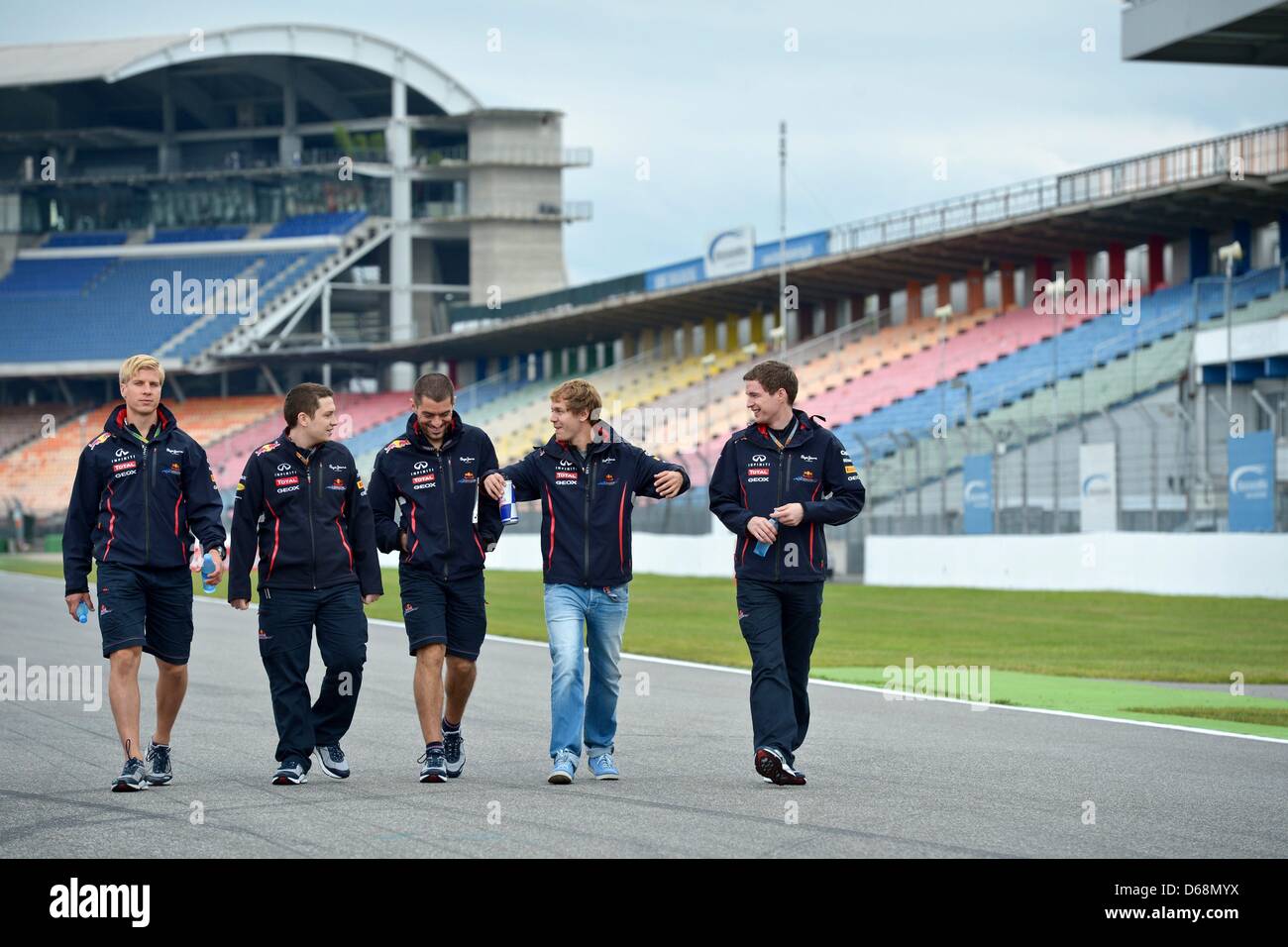 German Formula One driver Sebastian Vettel of Red Bull (2-R), his ...