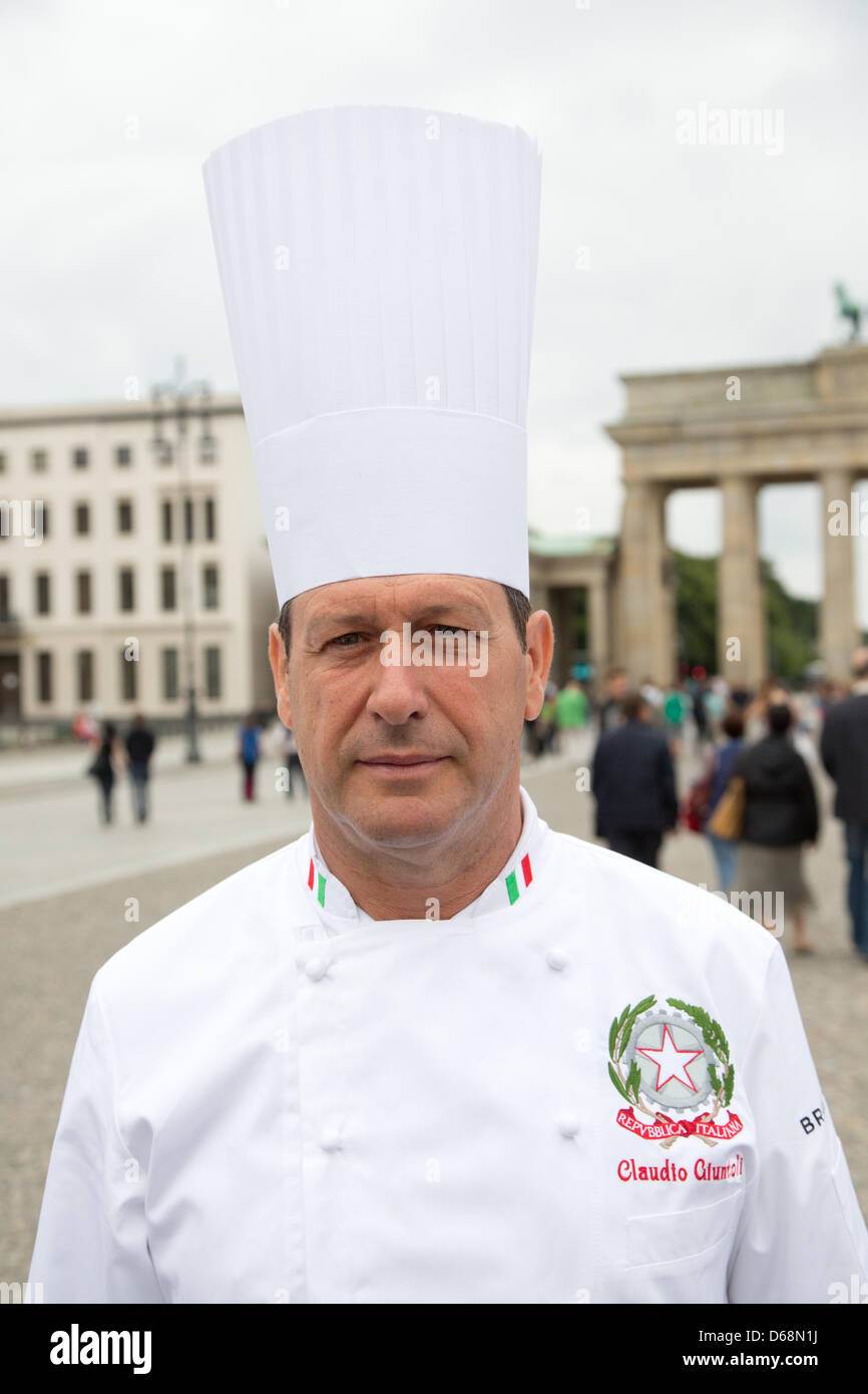 Italian chef Claudio Giuntoli poses in front of Brandenburg Gate in ...