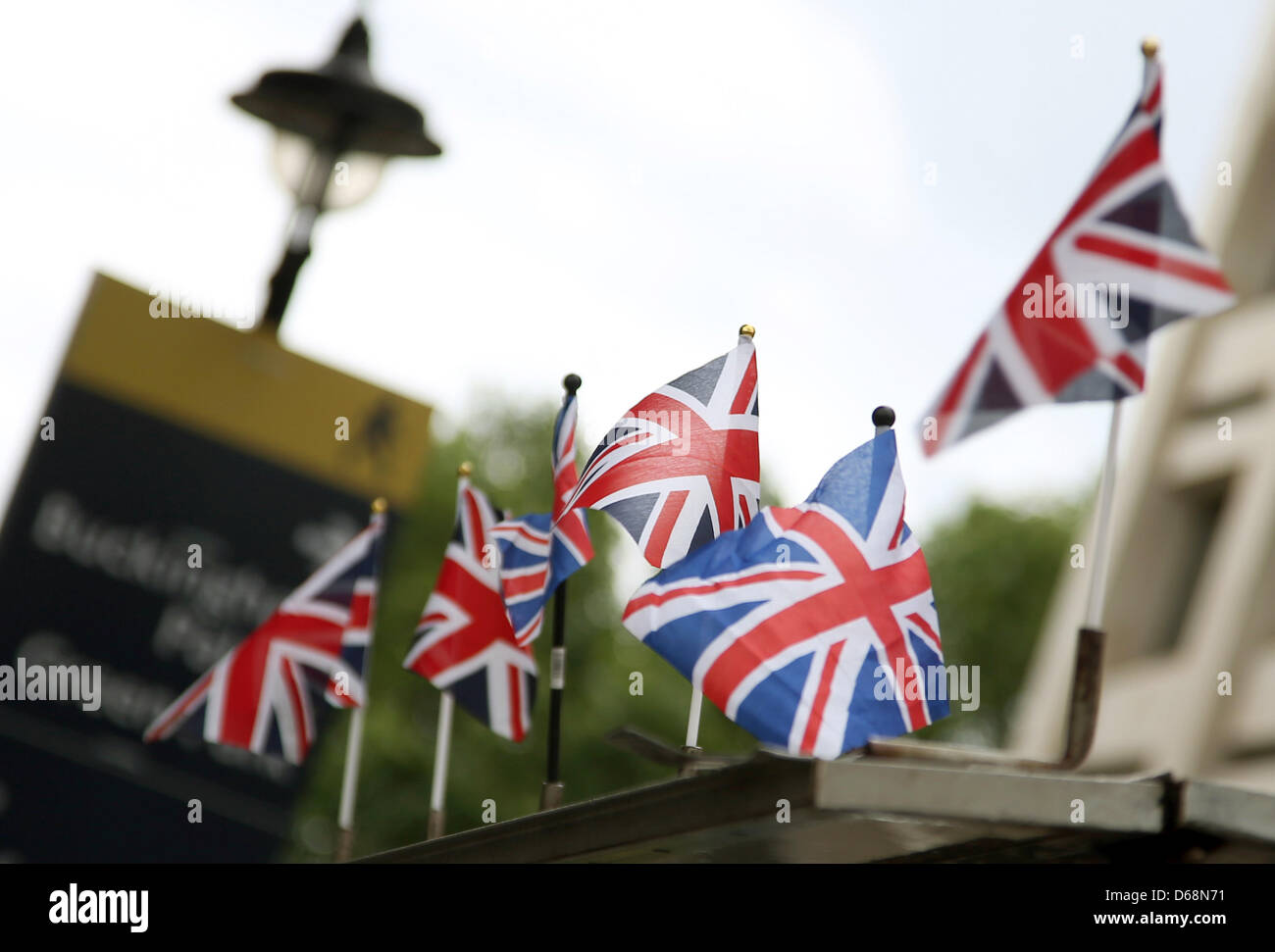 Small flags of Britains Union Jack are seen in a road in London, Great ...