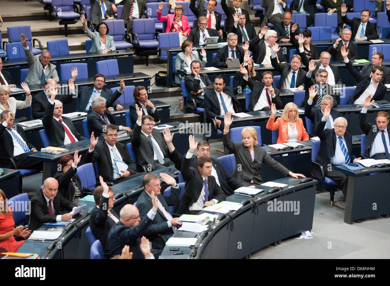 Members of the German parliament vote on a law for the religious ...