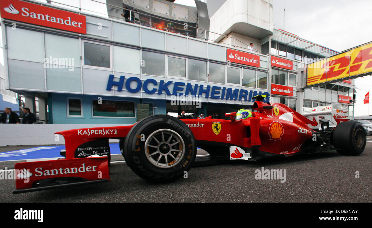 Brazilian Formula One driver Felipe Massa of Ferrari enters the pit ...