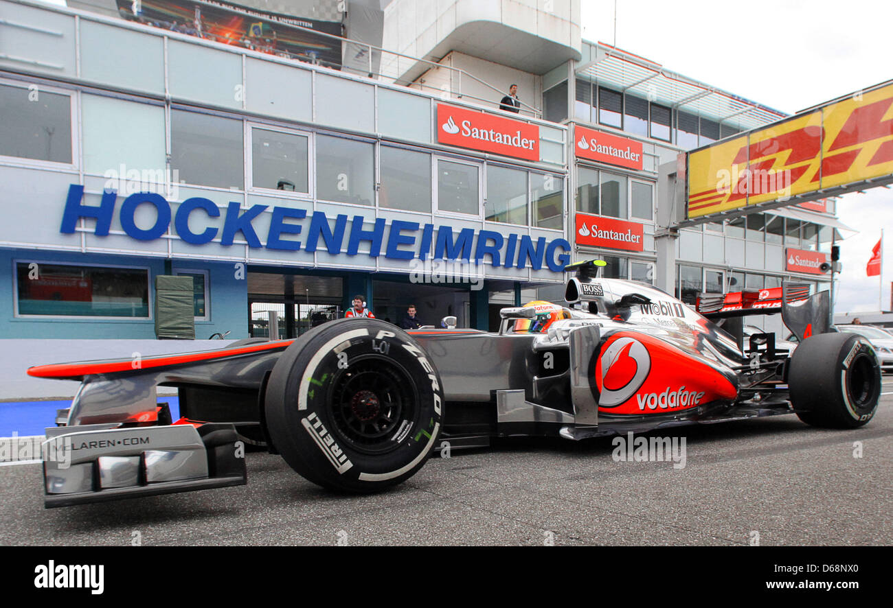 British Formula One driver Lewis Hamilton of McLaren Mercedes enters ...