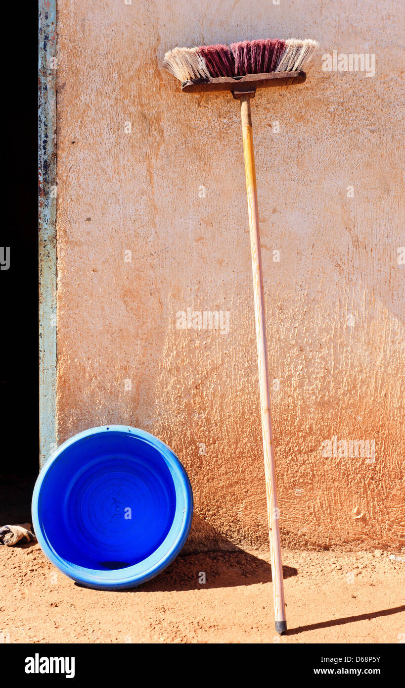 Old mop against a wall Stock Photo - Alamy