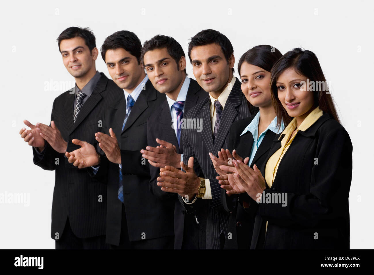 Business executives clapping Stock Photo - Alamy