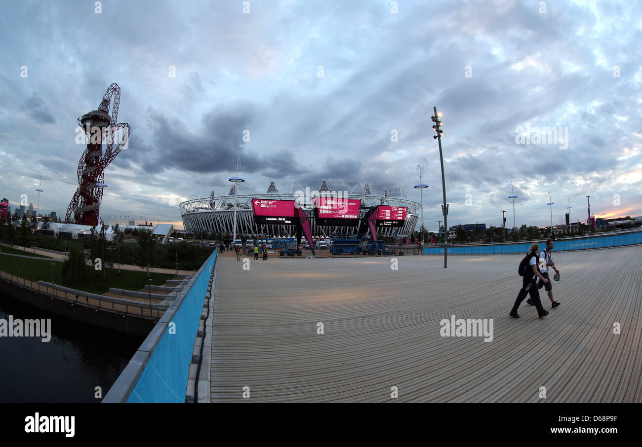 The Orbit Circus (l) and the Olympic Stadium (r) are pictured in London ...