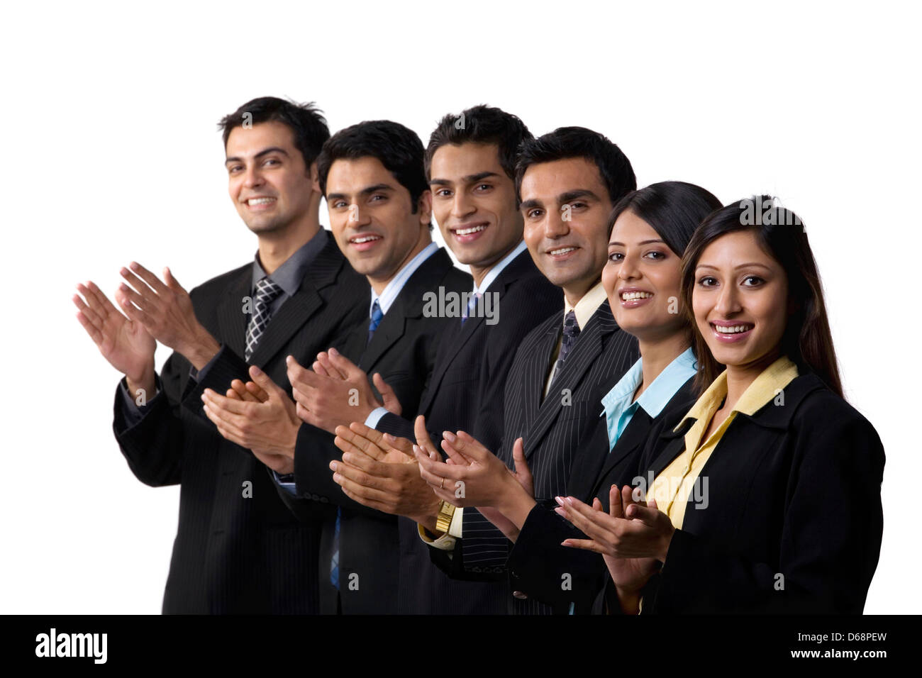 Portrait of business executives clapping Stock Photo - Alamy