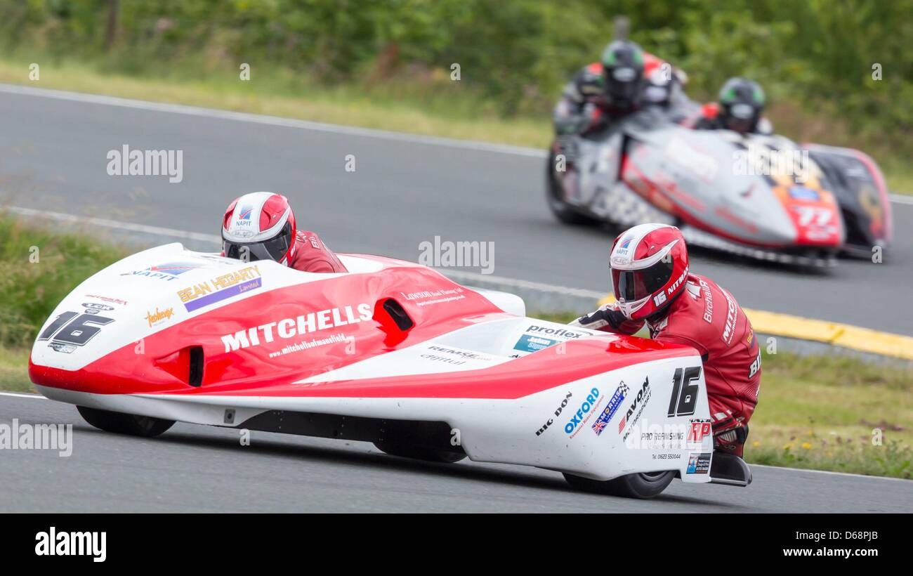 Ben and Thomas Birchall (GB) take off from the pit after a tire change ...
