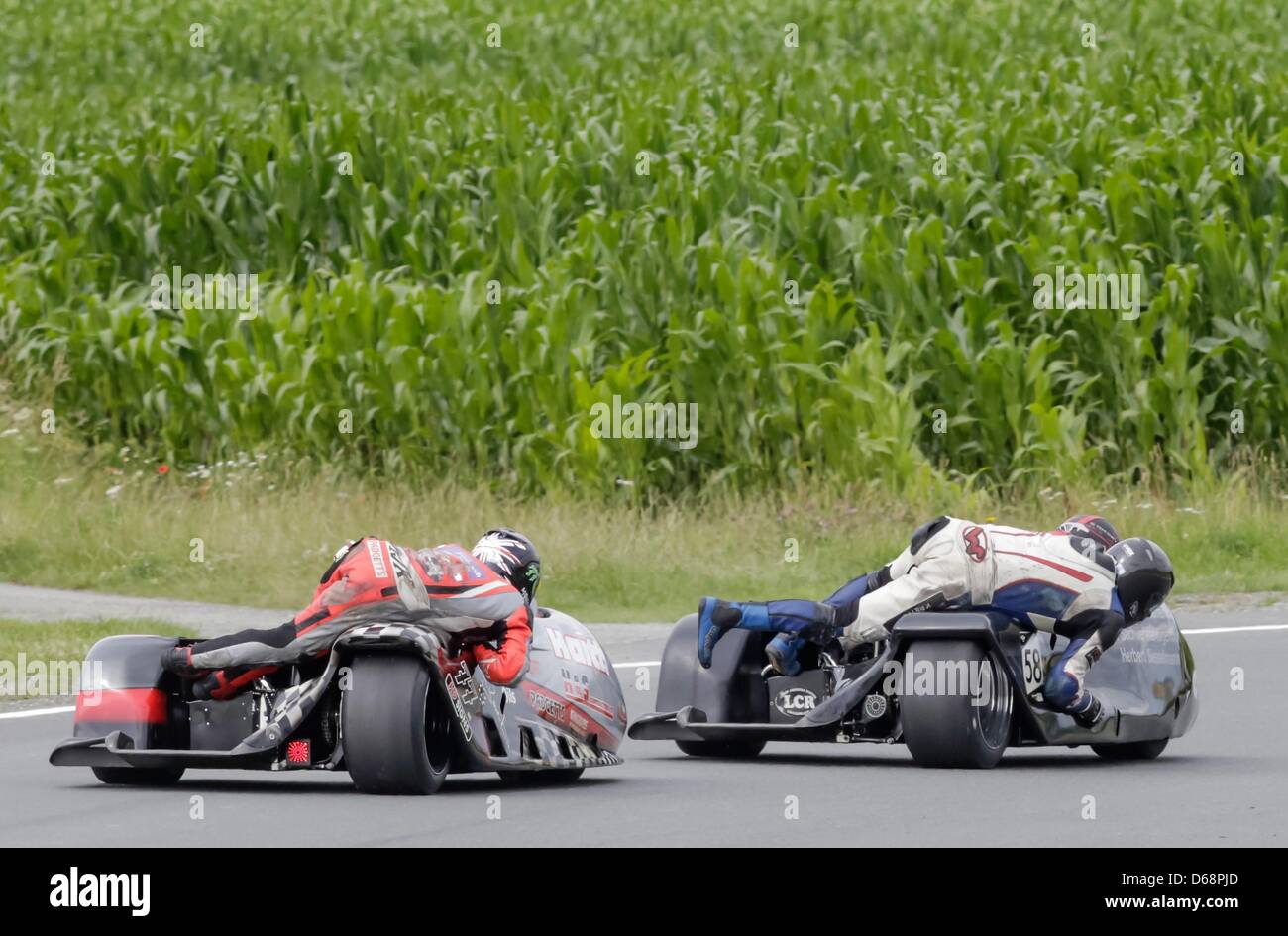 Sidecar drivers and co-drivers race during free training for the ...