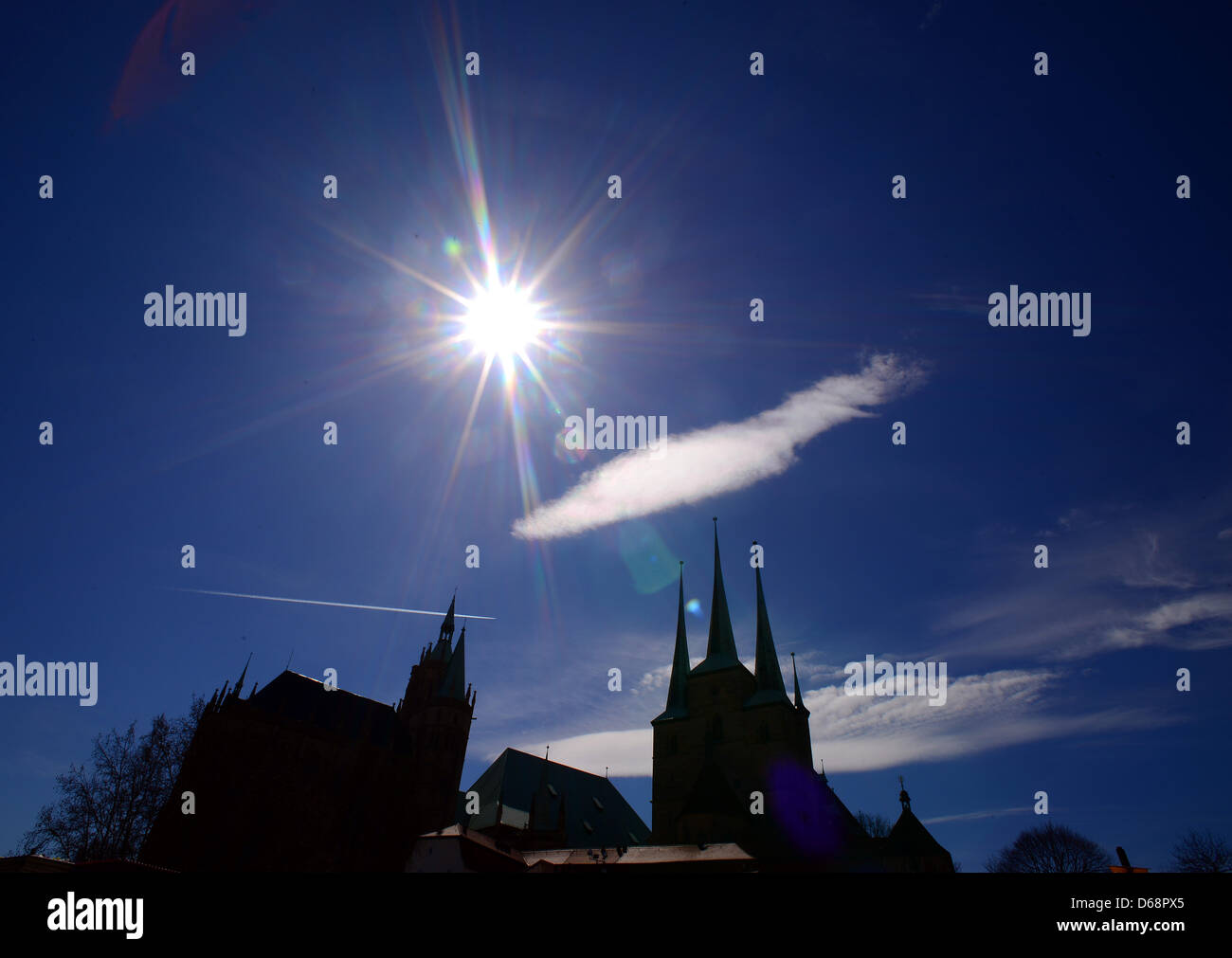 The sun shines in an almost cloud-less sky above the cathedral and St ...