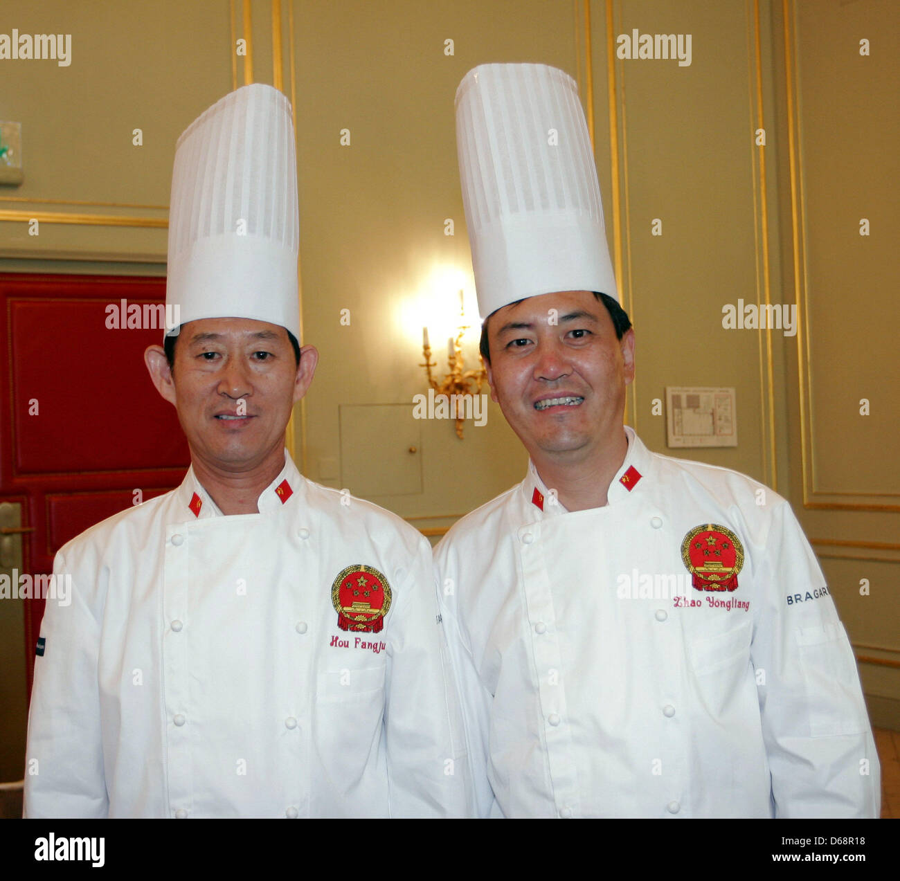 Chinese top chefs Hou Fangju (L) and Zhao Yongliang poses in Hotel ...