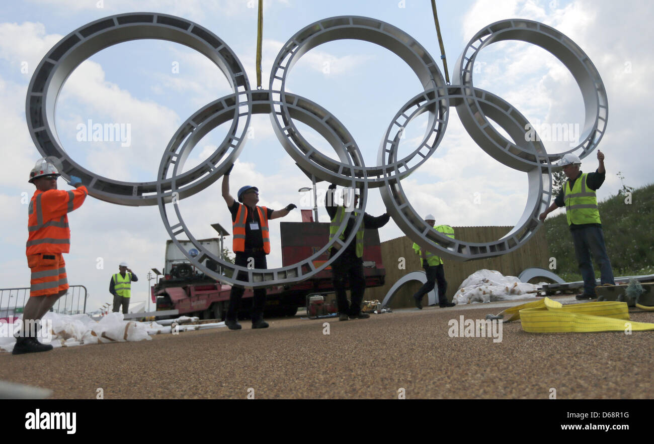 Workers prepare Olympic Rings at the Olympic Park in London, Great ...