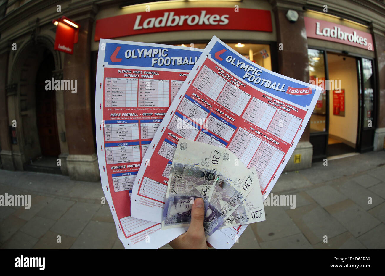 ILLUSTRATION - Betting tickets and banknotes pictured outside the ...